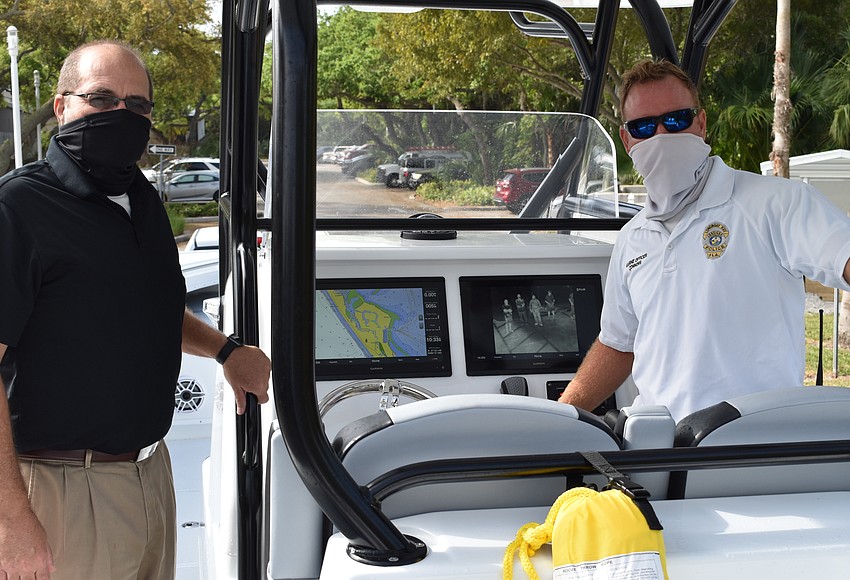 Your Observer | Photo - Town Manager Tom Harmer (left) and marine ...