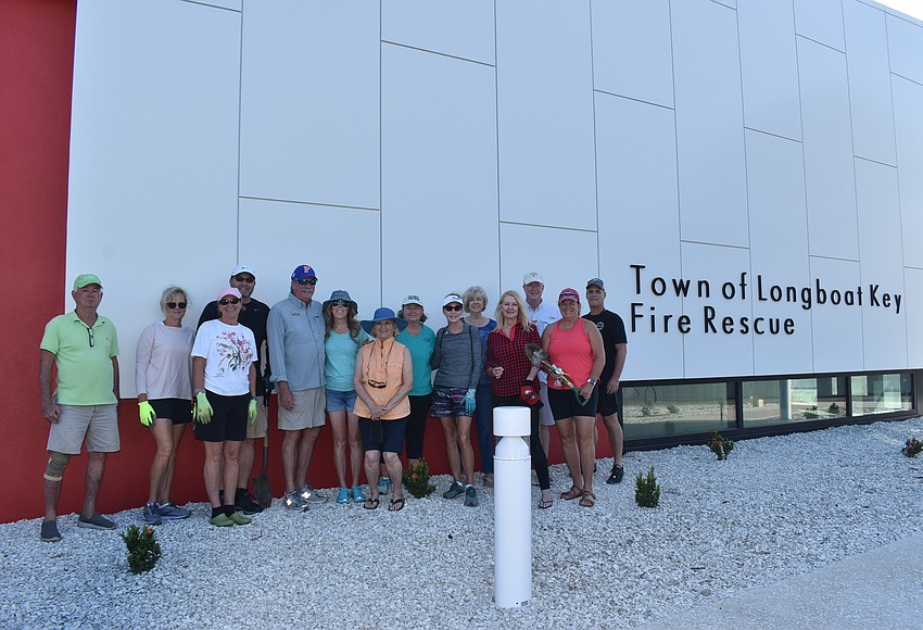 Your Observer | Photo - The planters pose with Paul Dezzi.