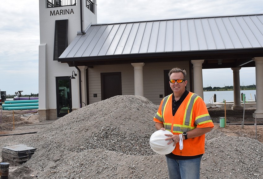 Your Observer | Photo - Jason Rinard, standing in front of the marina ...