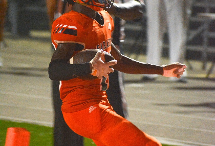 Your Observer | Photo - T.J. McKay scores the go-ahead touchdown for ...