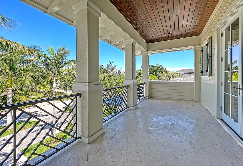 Your Observer | Photo - A second-floor veranda overlooks the pool deck ...
