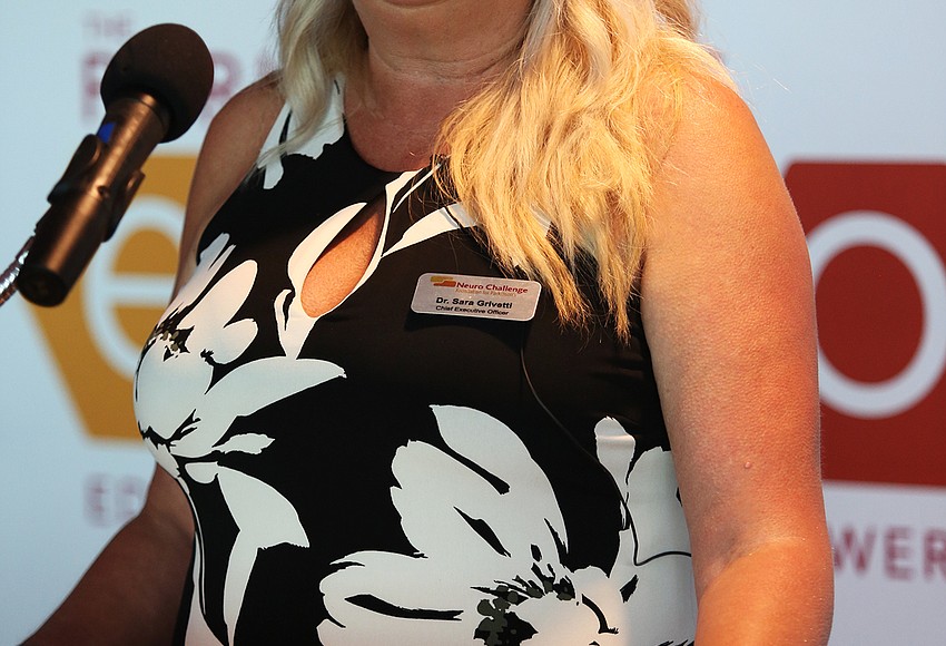 Your Observer | Photo - CEO Dr. Sara Grivetti welcomes the audience.