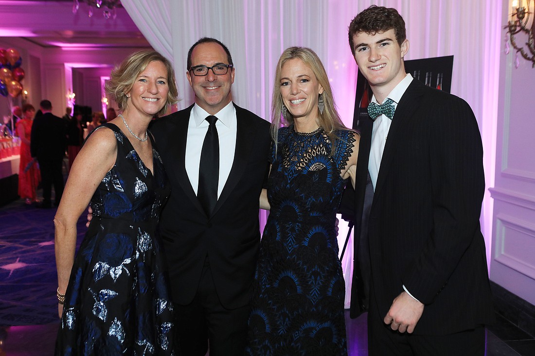 Photo: Tara and Larry Restieri with Greta and Myles Spiess | Your Observer