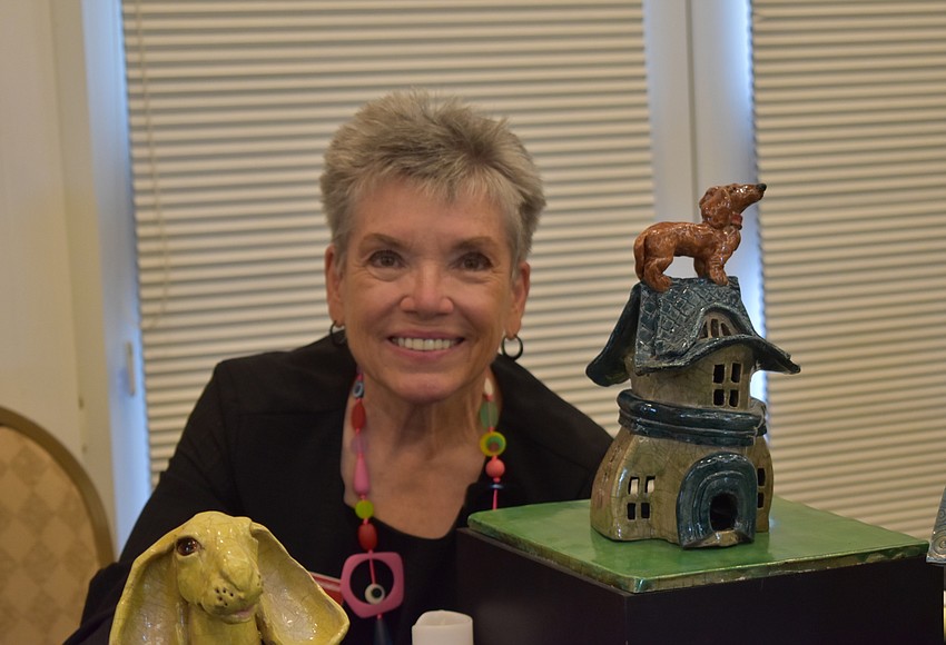 Your Observer | Photo - Susan Kerr poses with one of her sculptures ...