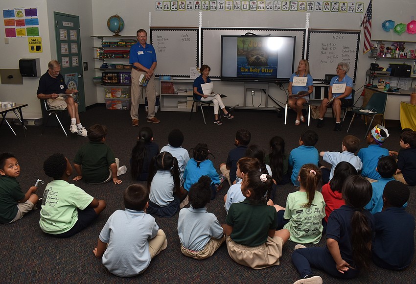Josh the Otter swims by Tuttle Elementary School