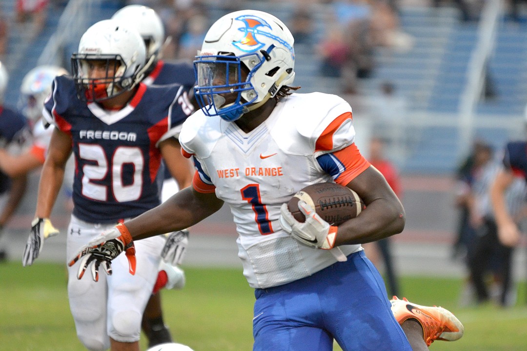 PHOTOS: West Orange football tops Freedom in weather-shortened game ...