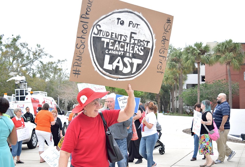 OCPS teachers, community activists rally for better work conditions ...