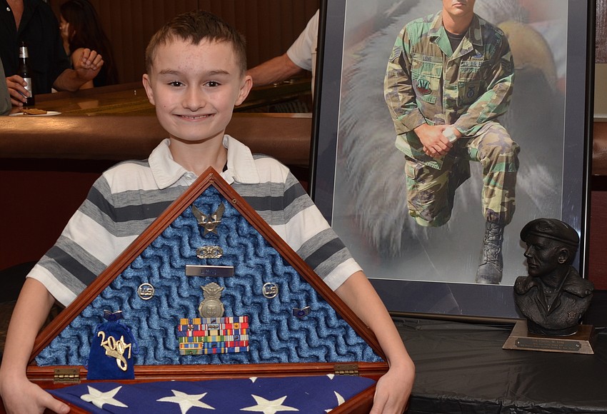 Family receives deceased son's lost military shadow box | West Orange ...