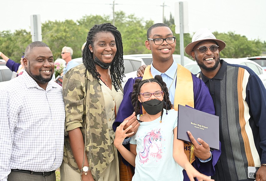 Your Observer | Photo - Graduate Jaylen Edwards and family.