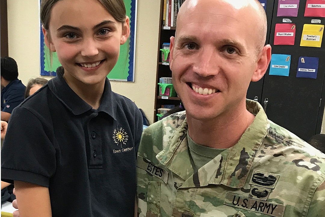 Army daughter receives certificate and commander's coin — and five ...