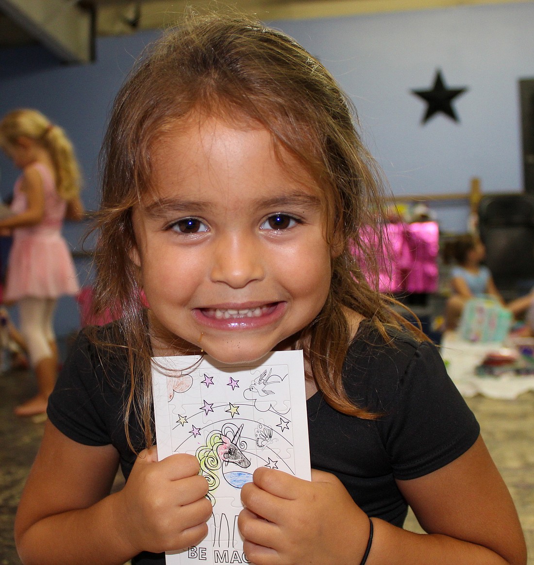 Photo: Kayla Rubino, 5, was excited to have her picture taken with her unicorn masterpiece ...