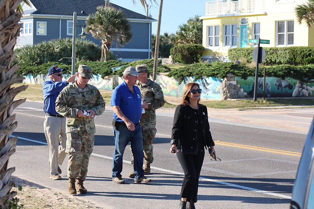 Army Corps of Engineers Brigadier General Daniel Hibner surveys beach ...