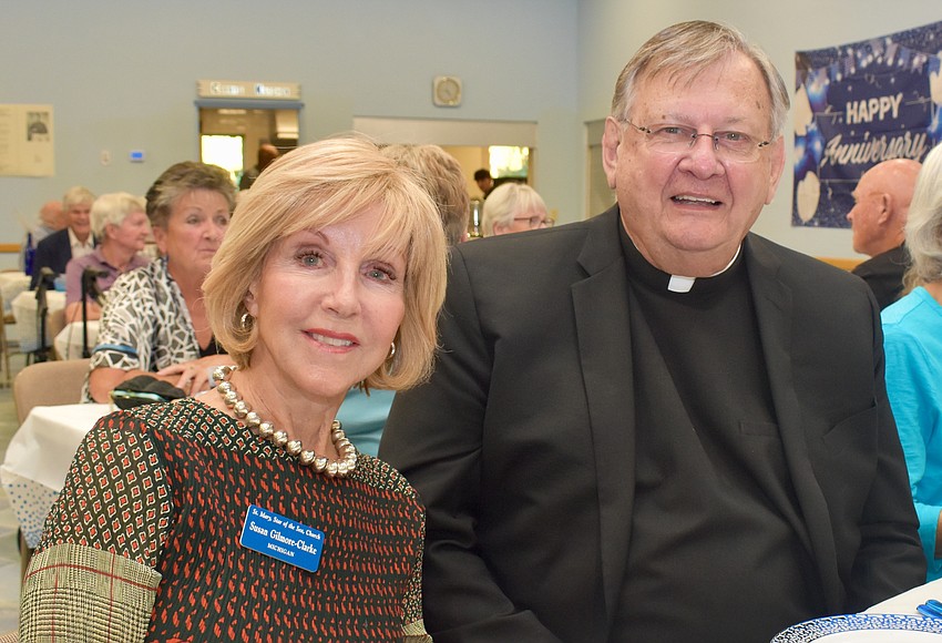 Your Observer | Photo - Susan Gilmore-Clarke and Father Phillip Schweda