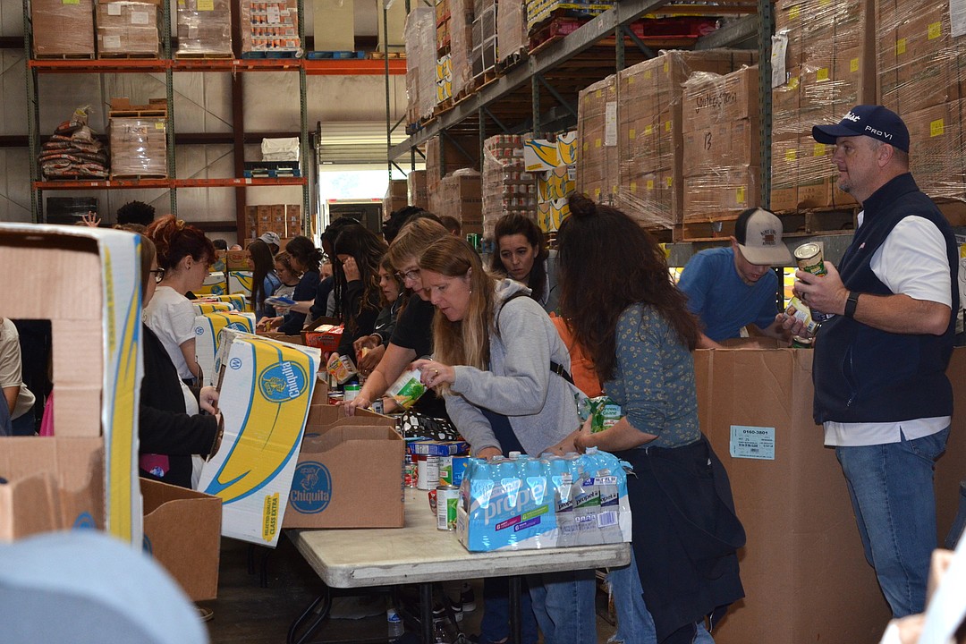 Southeastern Food Bank packs Thanksgiving boxes | West Orange Times ...