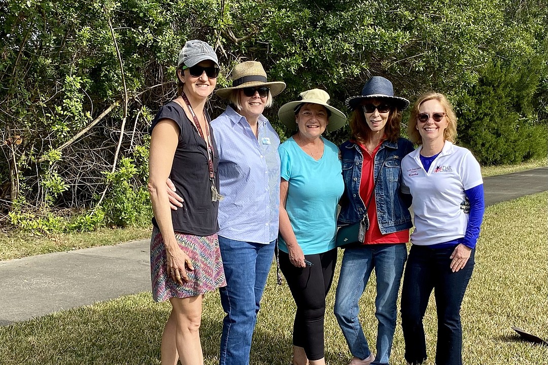DAR members plant a tree at the Environmental Discovery Center ...