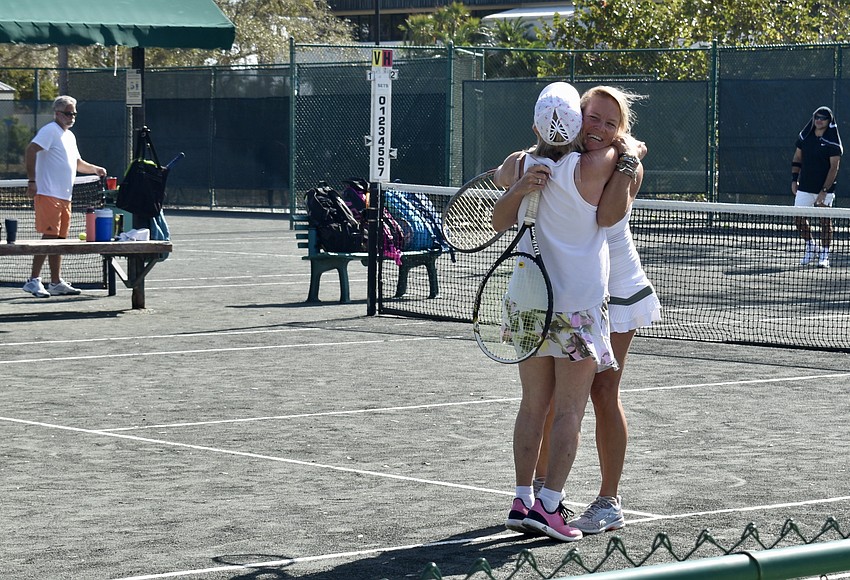 Your Observer | Photo - Sandy Campbell and Shannon Elliot hug after ...