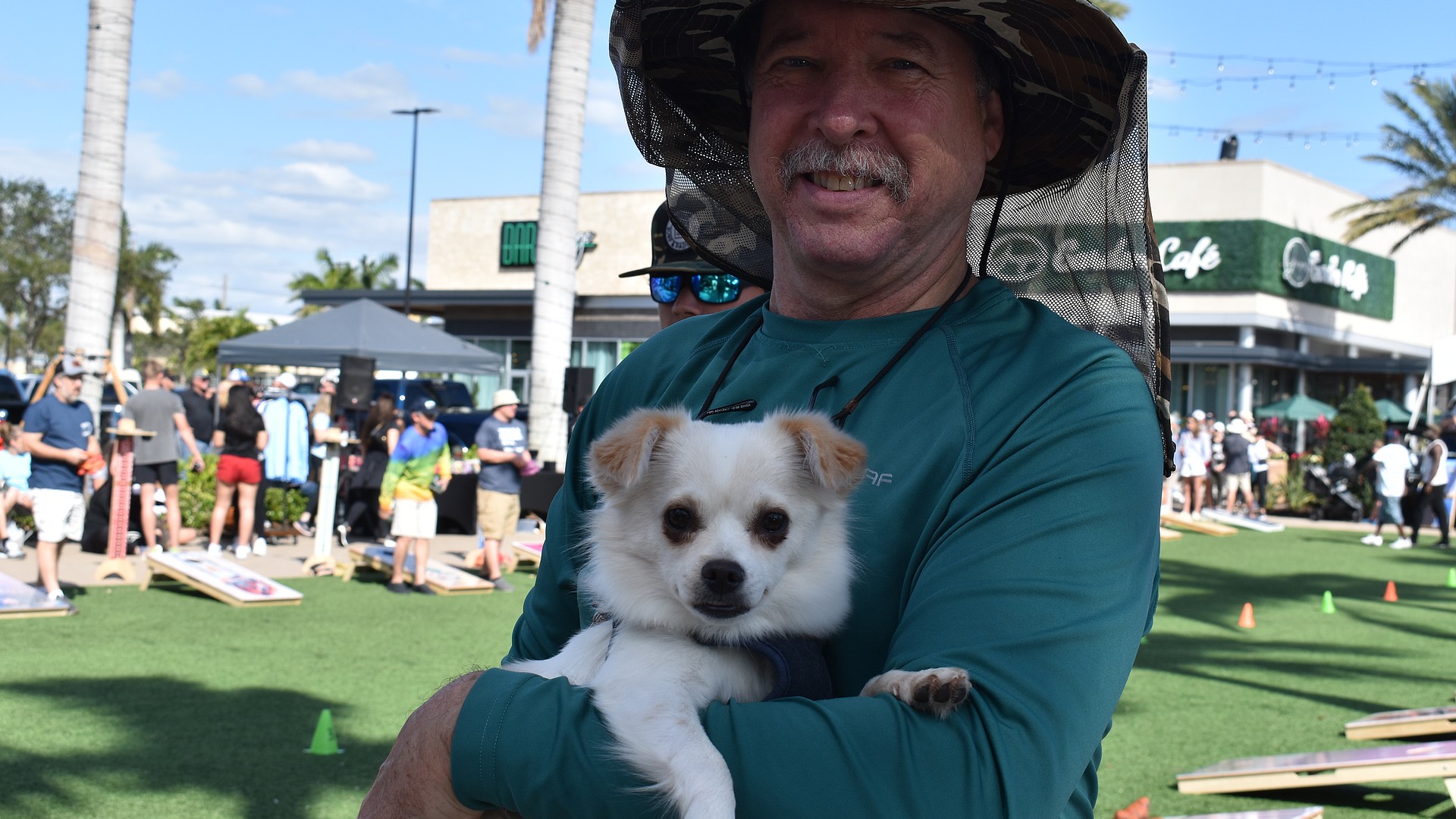 SPD hosts charity cornhole tournament | Your Observer