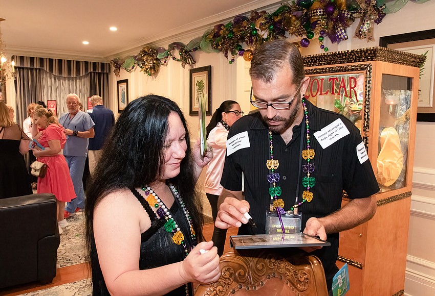 Business Observer | Photo - Amanda Beaudoin and Patrick Beaudoin work ...