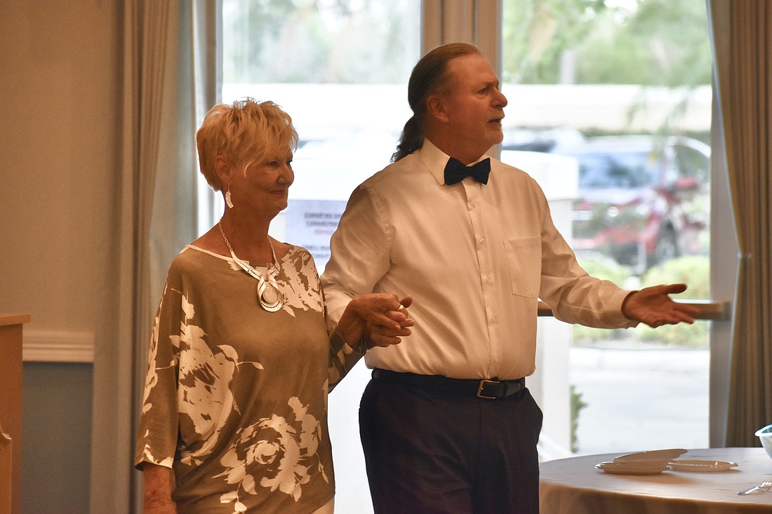 Photo: Chris Wertz closes out her turn on the stage with a hand from ...