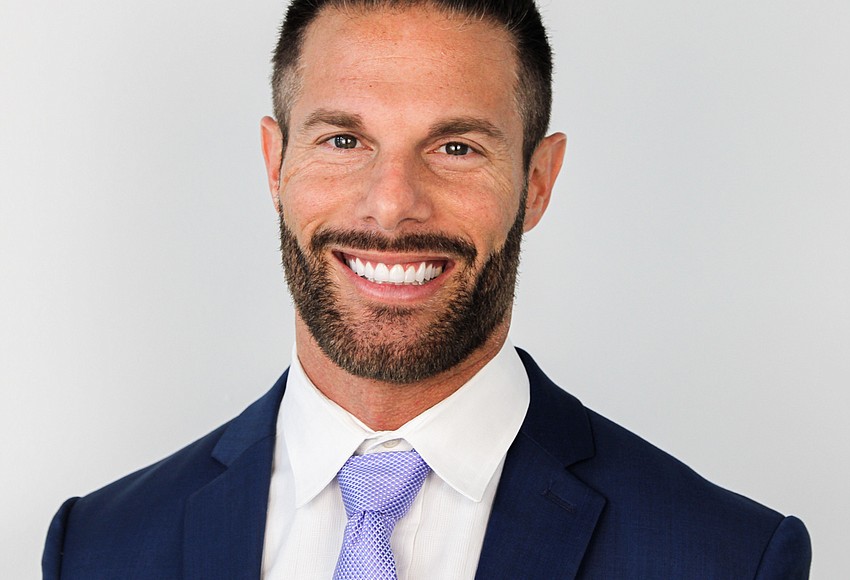 Business Observer | Photo - Dustin Robinson, owner and operator of Mr ...