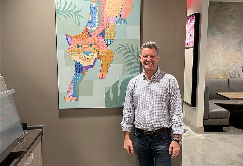 Jax Daily Record| Photo - Owner Mark Janasik stands near artwork ...