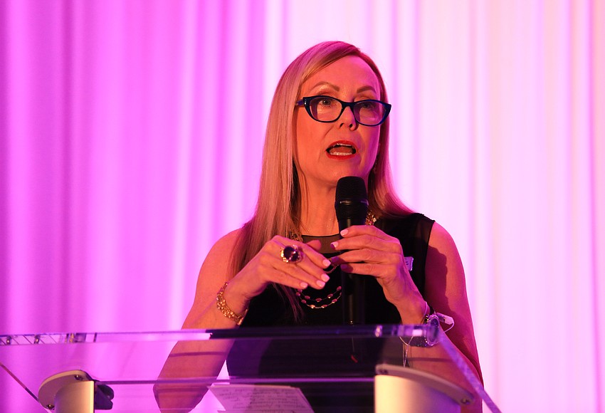 Your Observer | Photo - Event chair Vickie Smith opens the program.