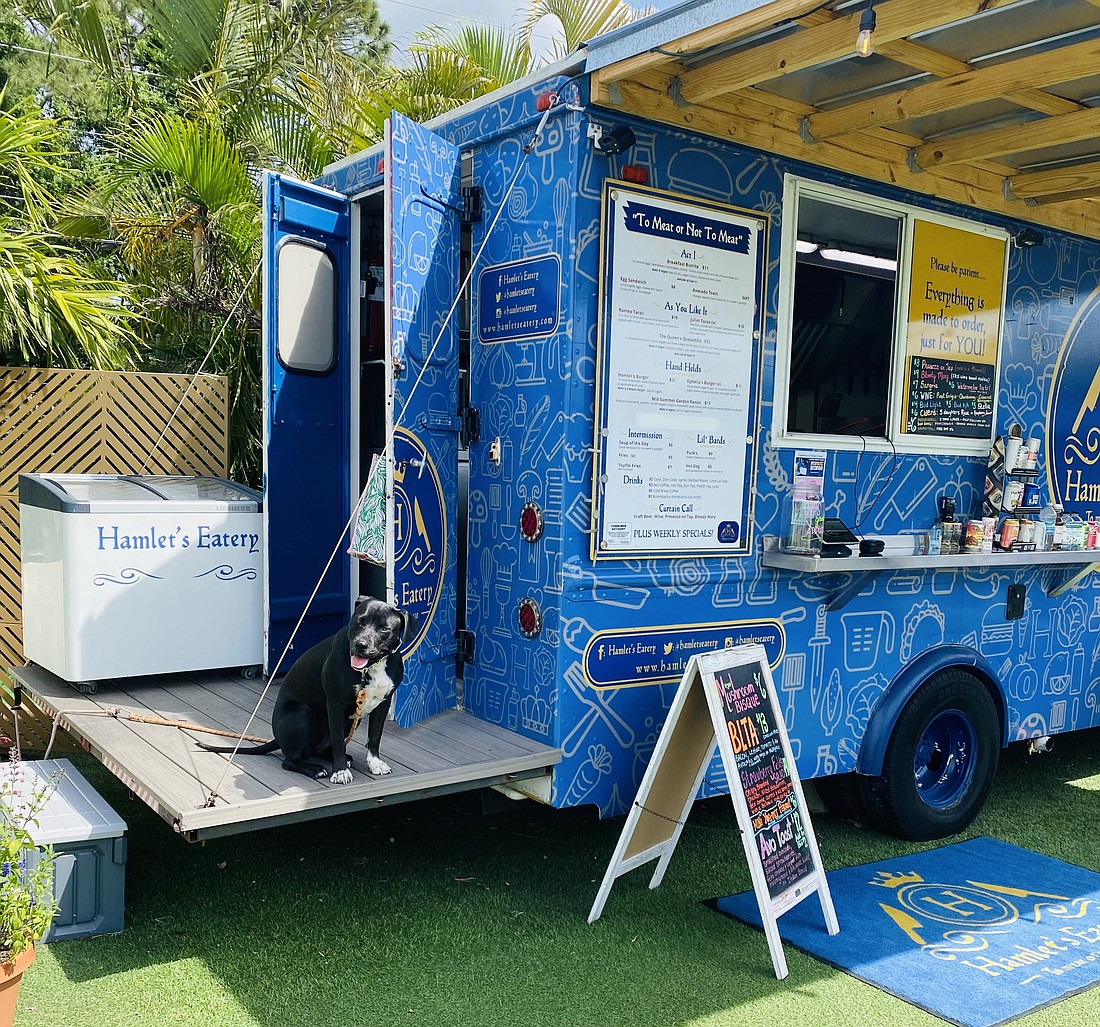 Photo: Kim Livengood's rescue dog, Skylar, keeps watch over the food ...