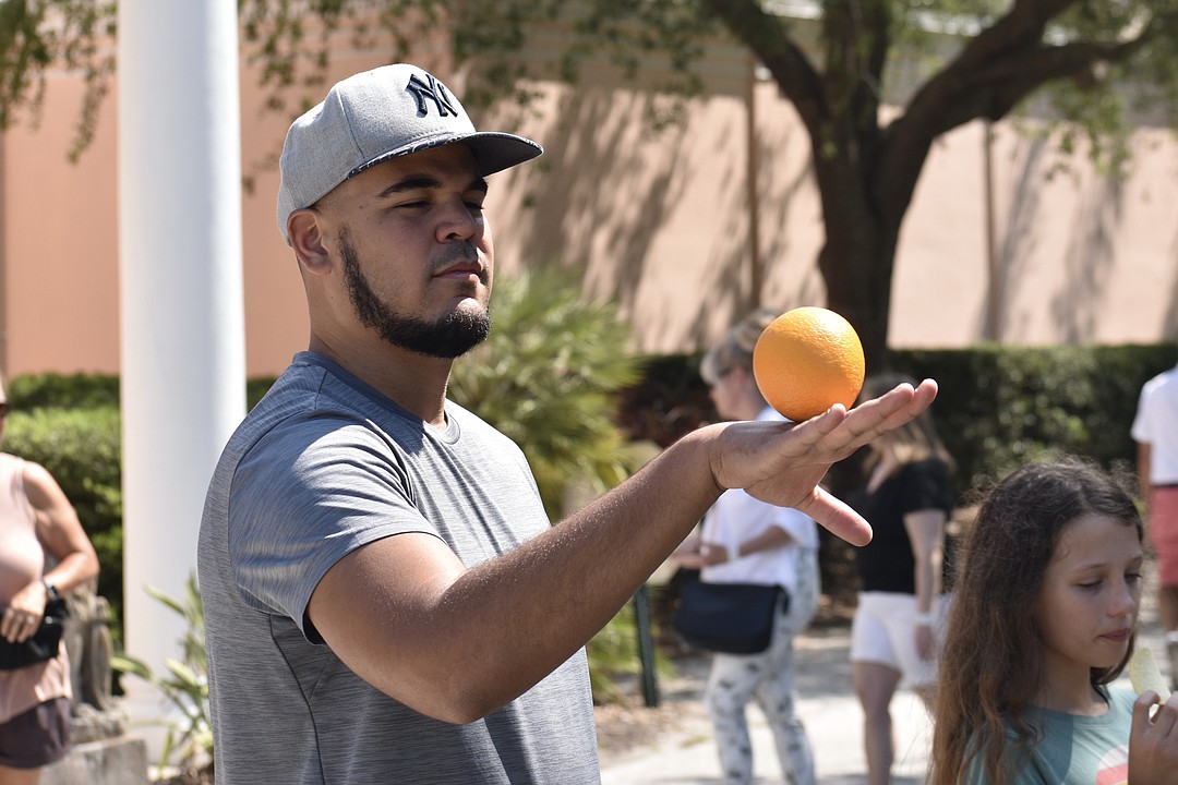 Attendees discover the joys of juggling at Ringling Museum | Your Observer
