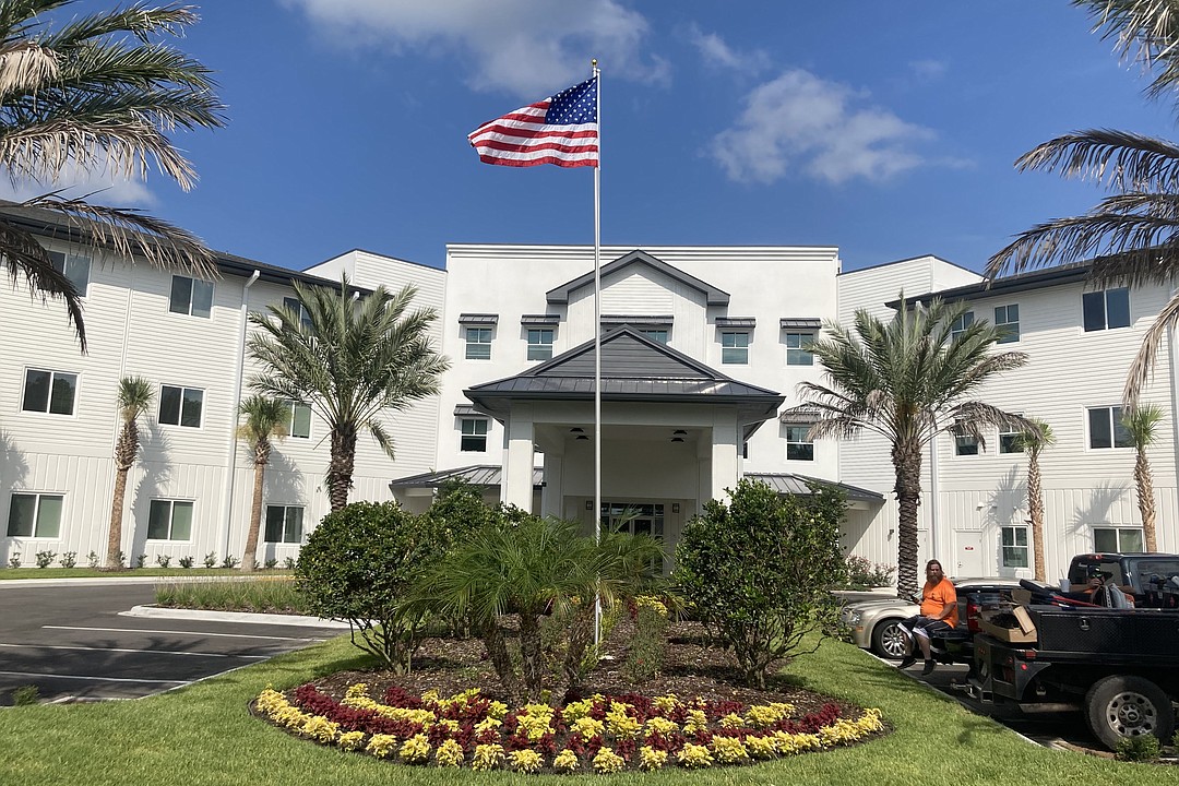 Paradise Pointe holds flag raising ceremony for Fourth of July ...