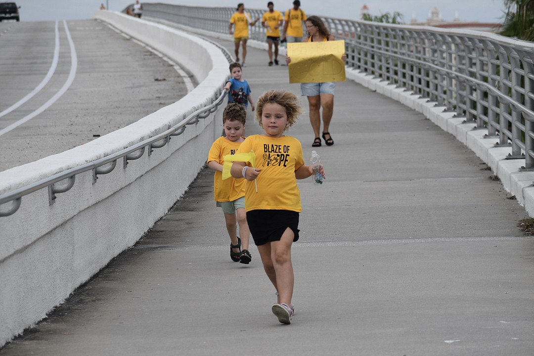 Blaze of Hope walk raises money for families of children with cancer ...