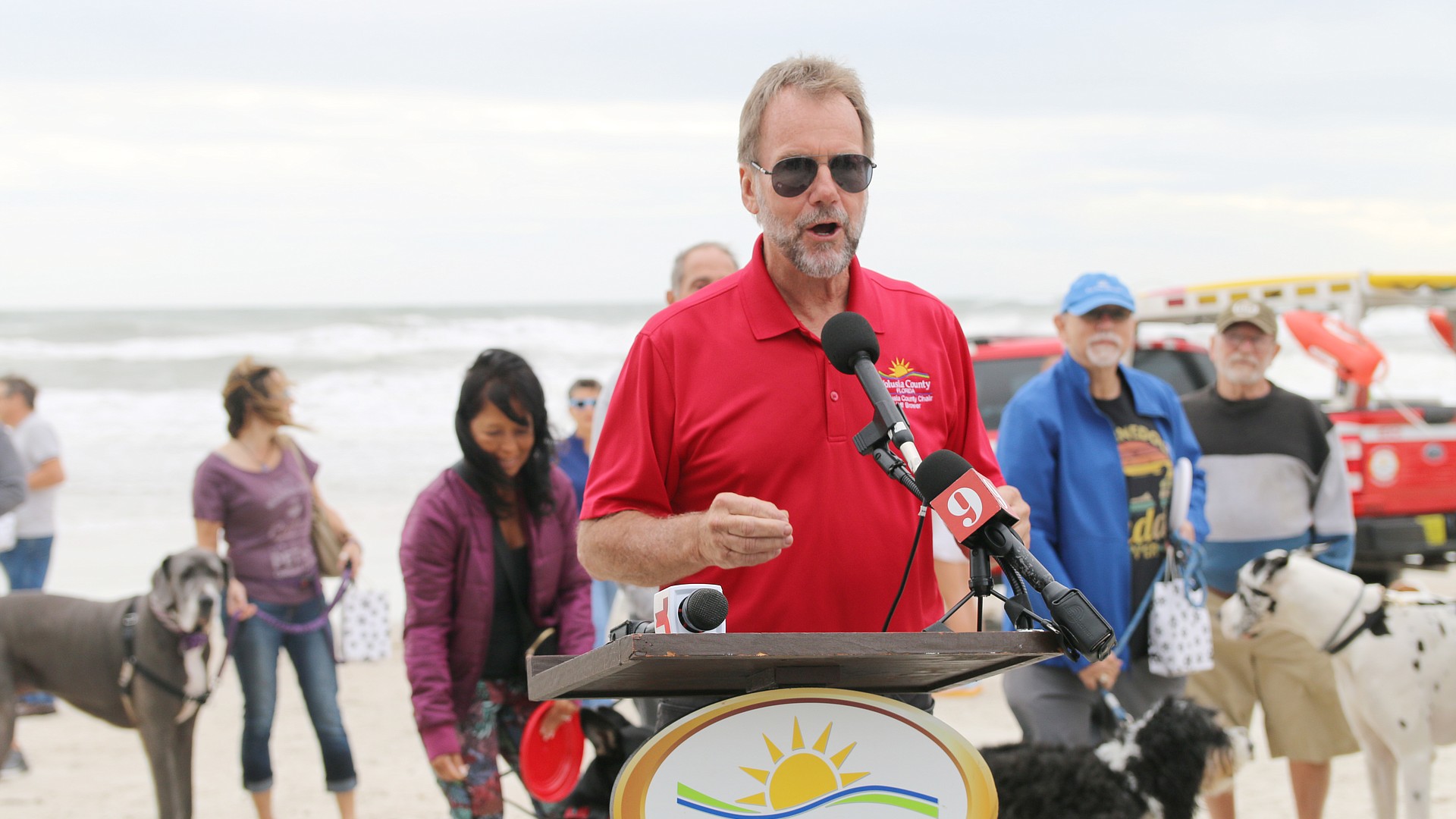 A round of a-paws: Volusia celebrates launch of dog-friendly beach ...