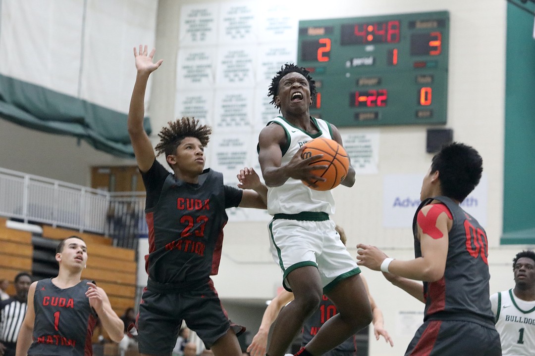 Flagler Palm Coast boys basketball team falls short against undefeated ...