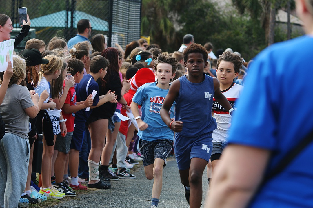Race day: Pine Trail Elementary sees record number of Pioneer Mile ...