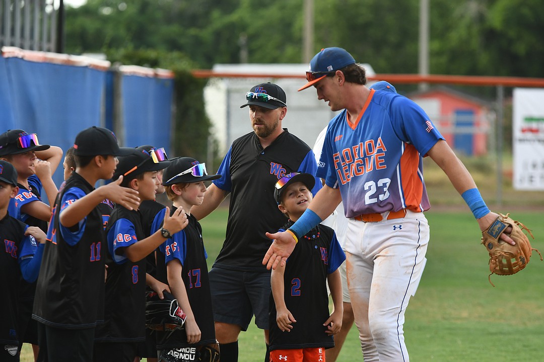 PHOTOS: Winter Garden Little League champions honored at Squeeze game ...