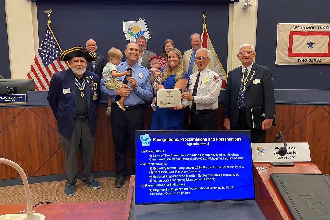 Flagler County paramedic awarded medal during Flagler County Commission ...