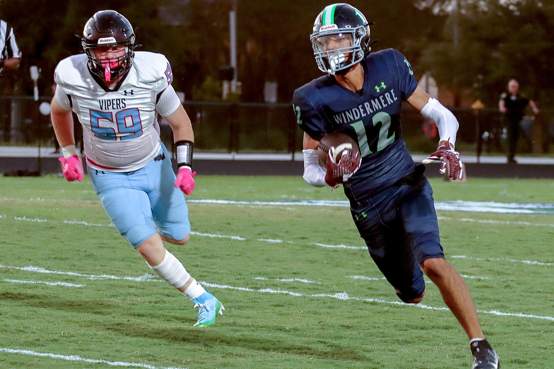 Windermere football wins big in stadium-opening game against Lake Buena ...