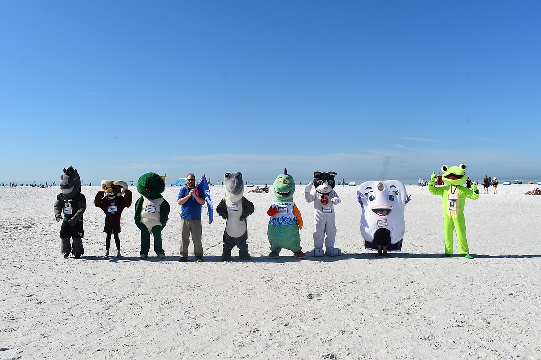 Local mascots come together in race to promote Run for the Turtles ...