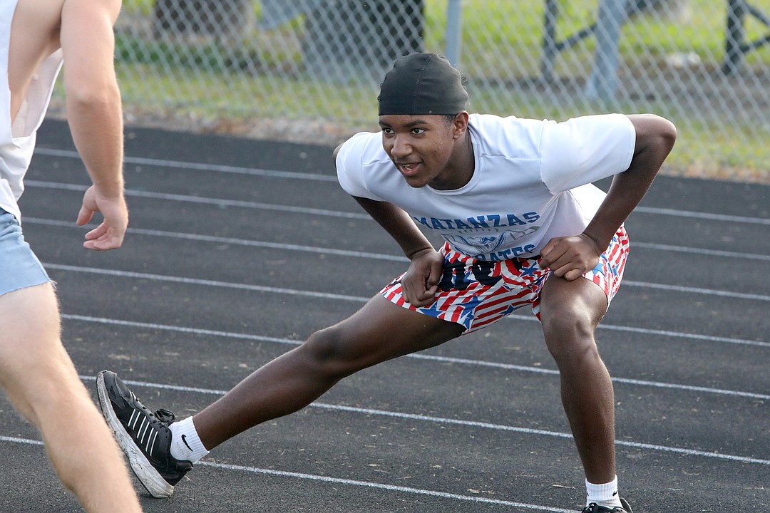 Matanzas football players honor fallen service member with red, white ...