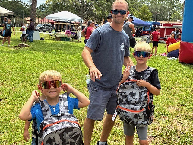 200 backpacks with school supplies distributed at the St. Joe Plaza Back to School Block Party ...