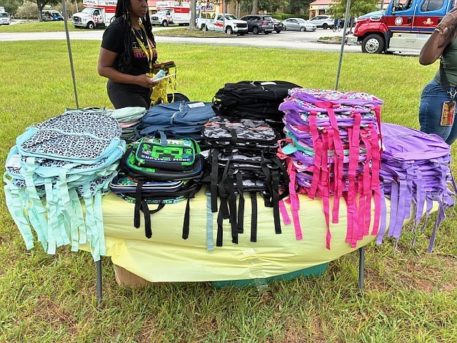 200 backpacks with school supplies distributed at the St. Joe Plaza Back to School Block Party ...