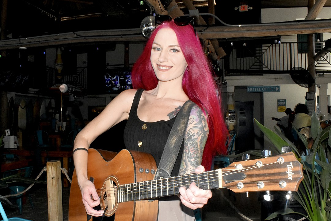 Singer takes a long musical path to be a Siesta Key mainstay | Your ...