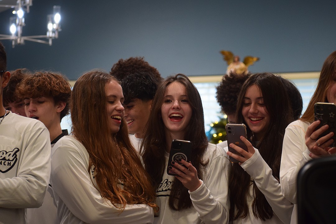 Lakewood Ranch wrestlers give back to their community through caroling ...