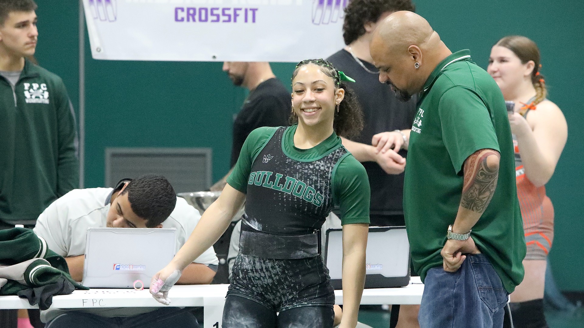 Two state weightlifting championships, with possible records along the ...