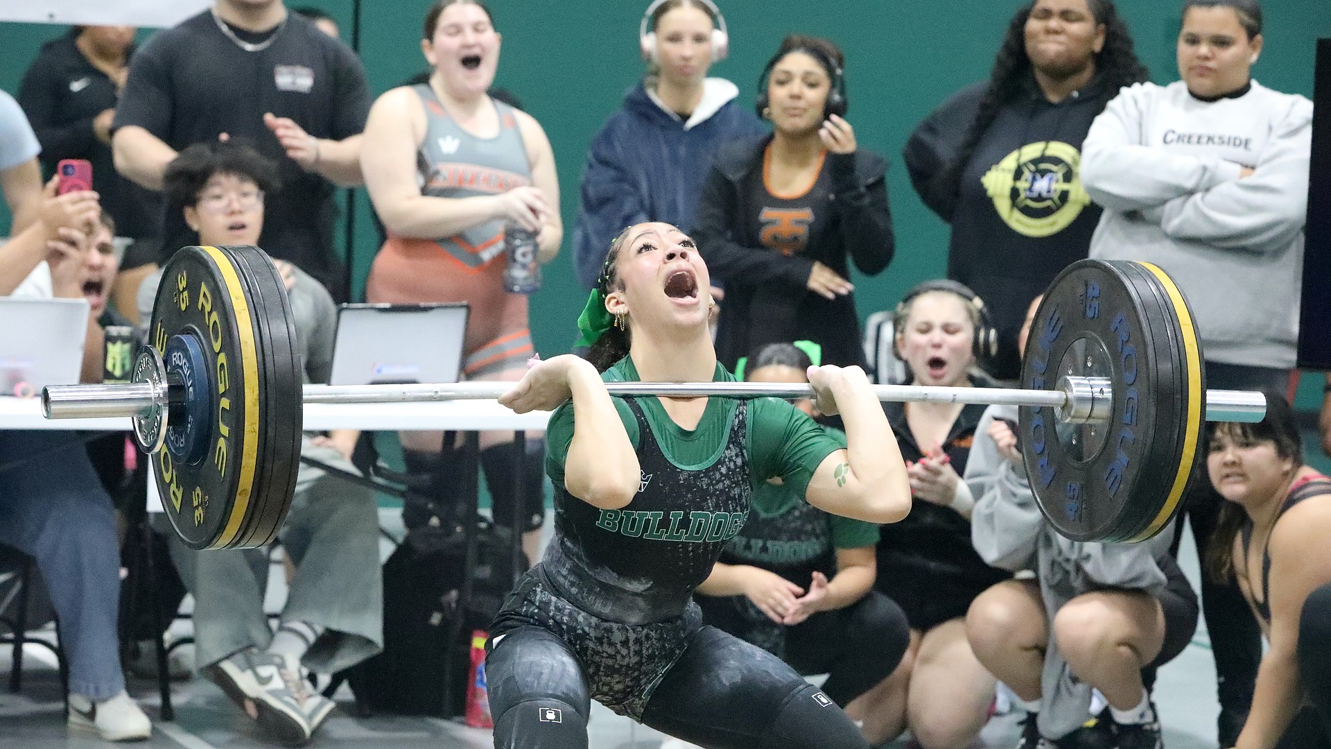 Two state weightlifting championships, with possible records along the ...