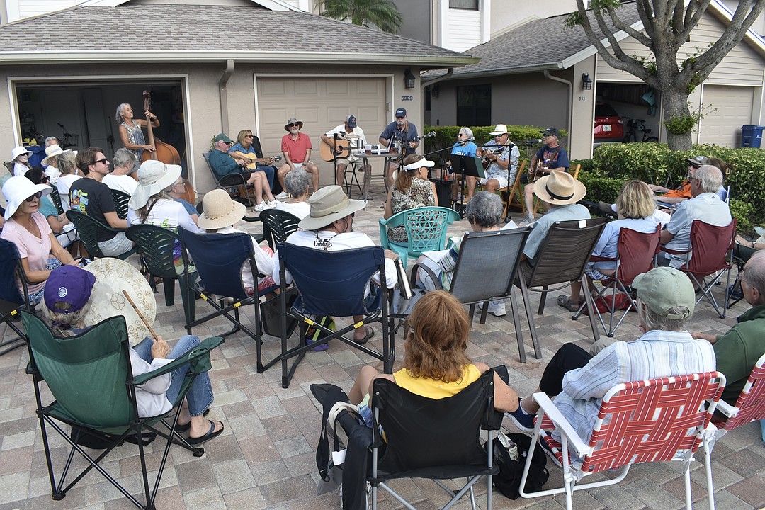 Driveway band brings neighbors together through music | Your Observer