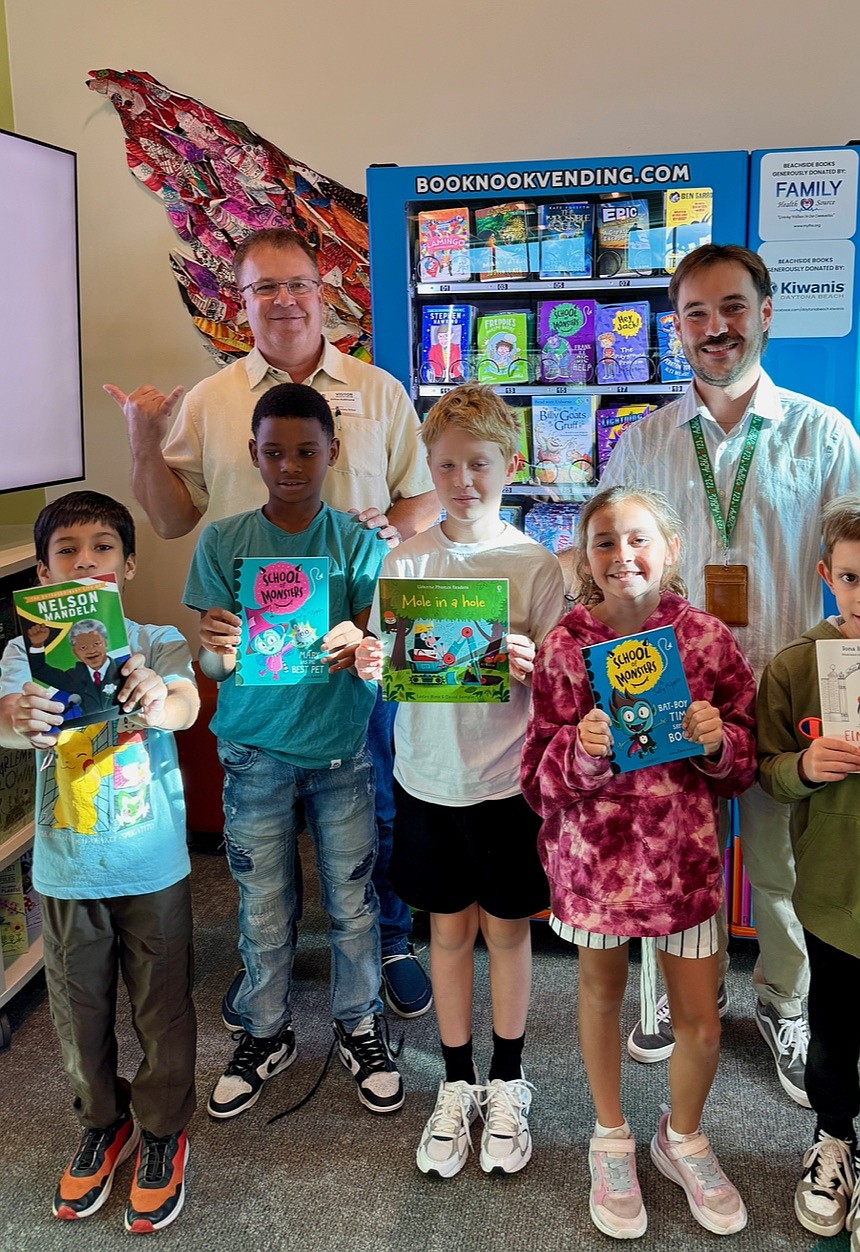 Beachside Elementary unveils new book vending machine | Observer Local News